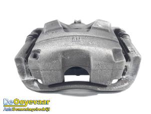 Pinzas de freno izquierda delante con código del motor 012345 stock