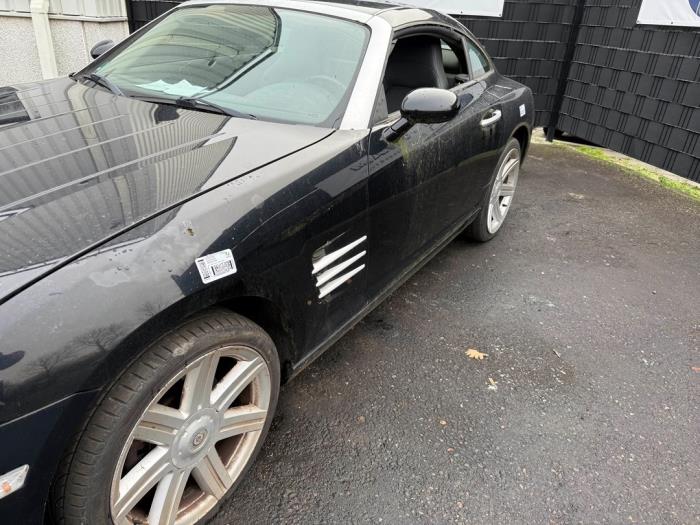 Front wing, left Chrysler Crossfire 3.2 V6 18V P41 - 05099707AA